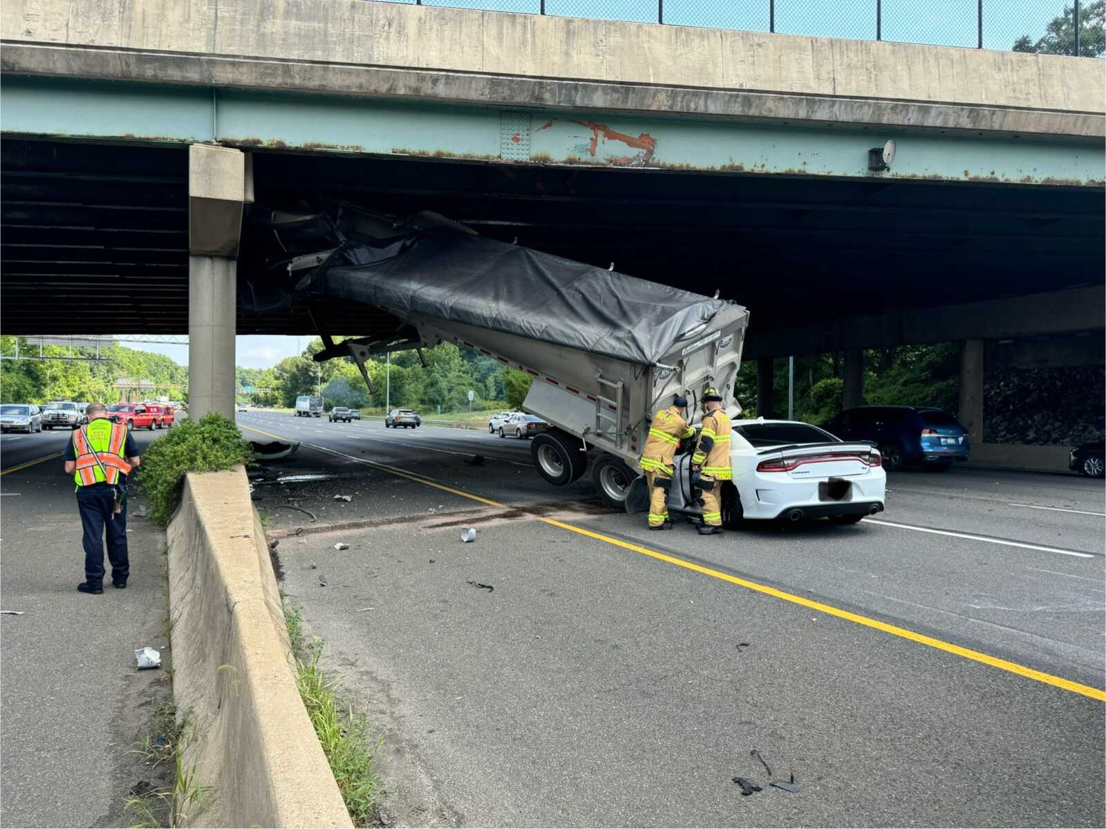 Truck Trailer Gets Stuck Under I-495 Bridge - The MoCo Show
