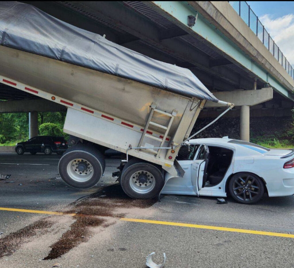 Truck Trailer Gets Stuck Under I-495 Bridge - The MoCo Show